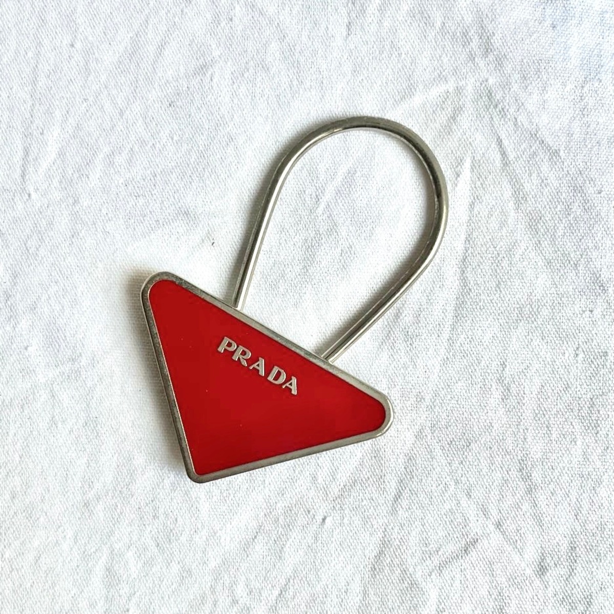 PRADA "Red×Silver" Triangle Logo Metal Key Charm | CARBOOTS