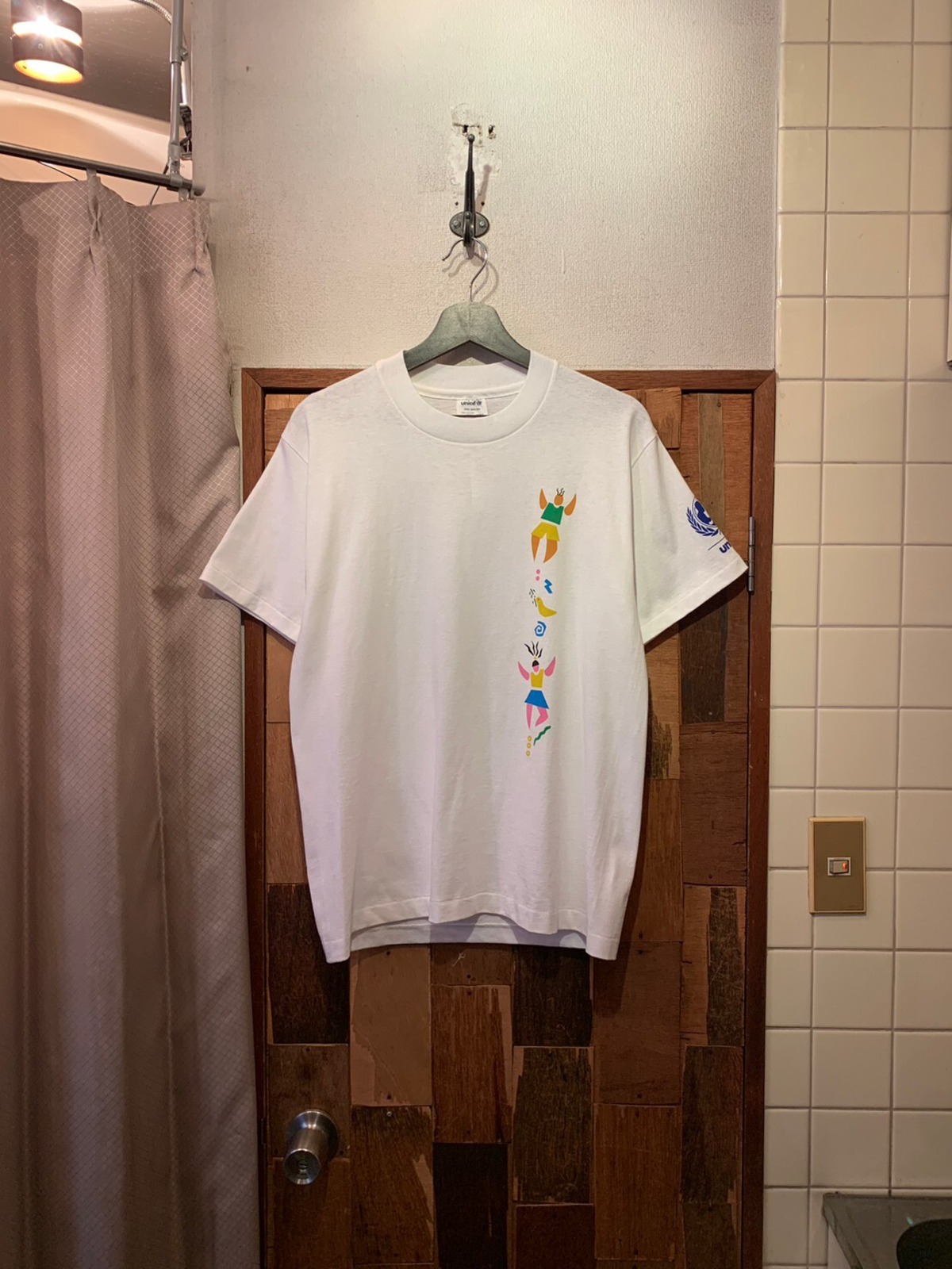 “unicef” 90’s white cotton printed S/S Tee made in U.S.A | LAUGH