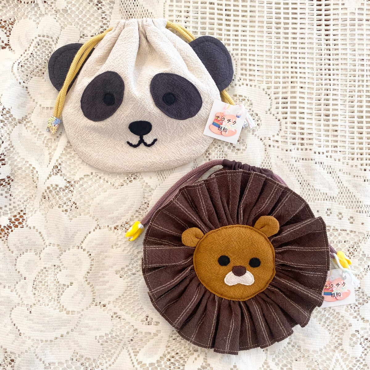 【チクチク日和】どうぶつ巾着袋〈パンダとライオン〉 | coromani