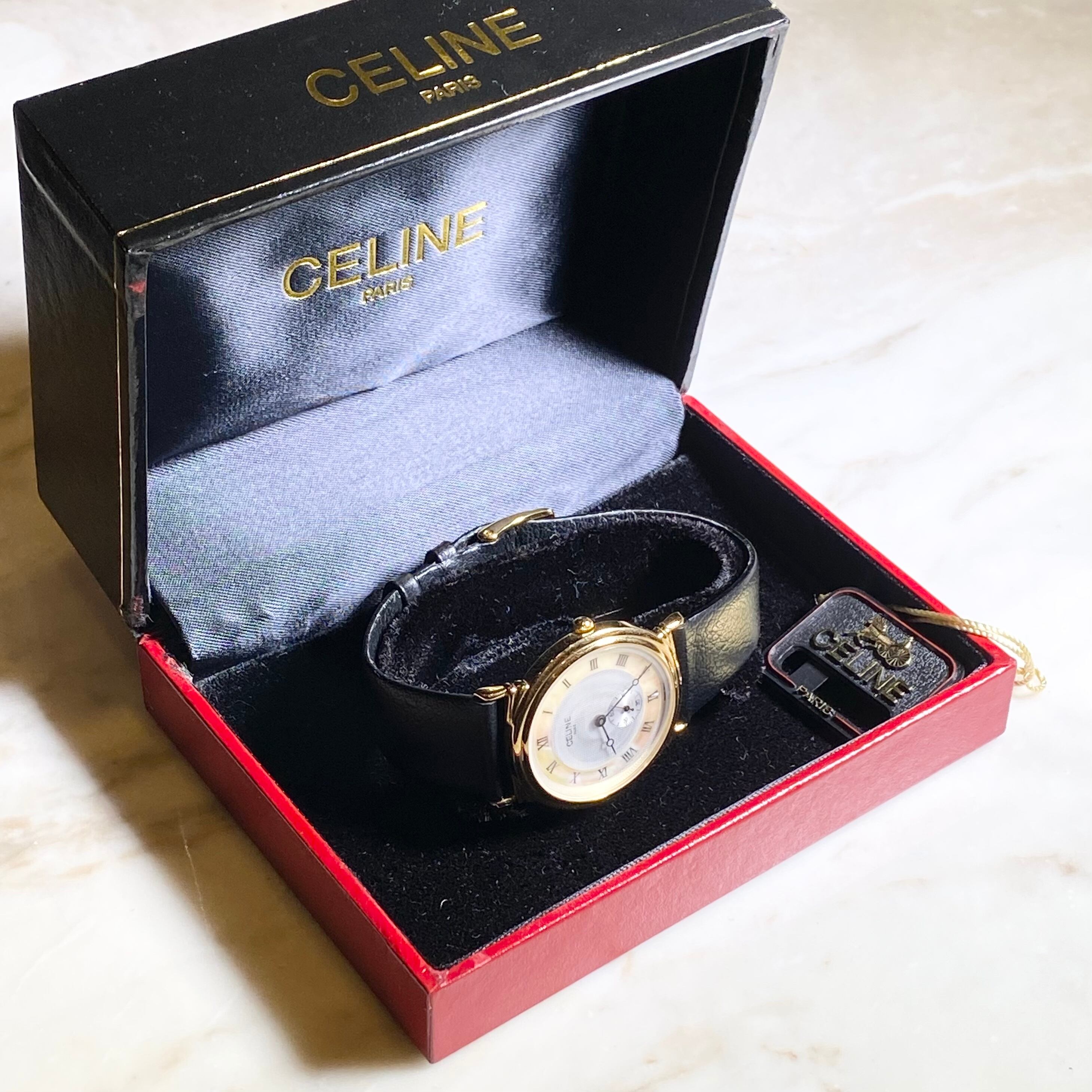 CELINE shell dial quartz watch | NOIR ONLINE