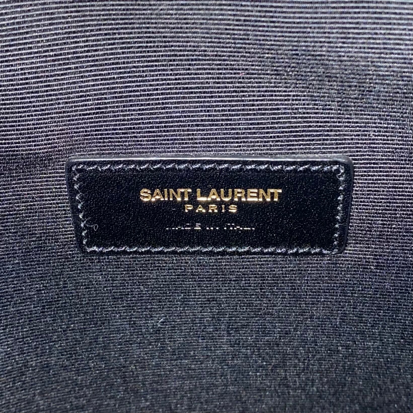 SAINT LAURENT PARIS “YSL” pattern pvc clutch bag | NOIR ONLINE