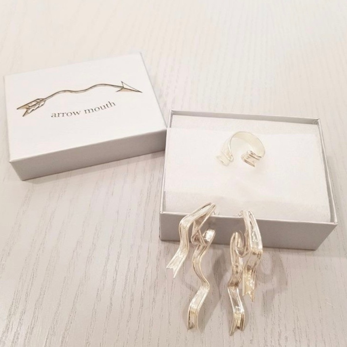 ribbon pierce | arrow mouth