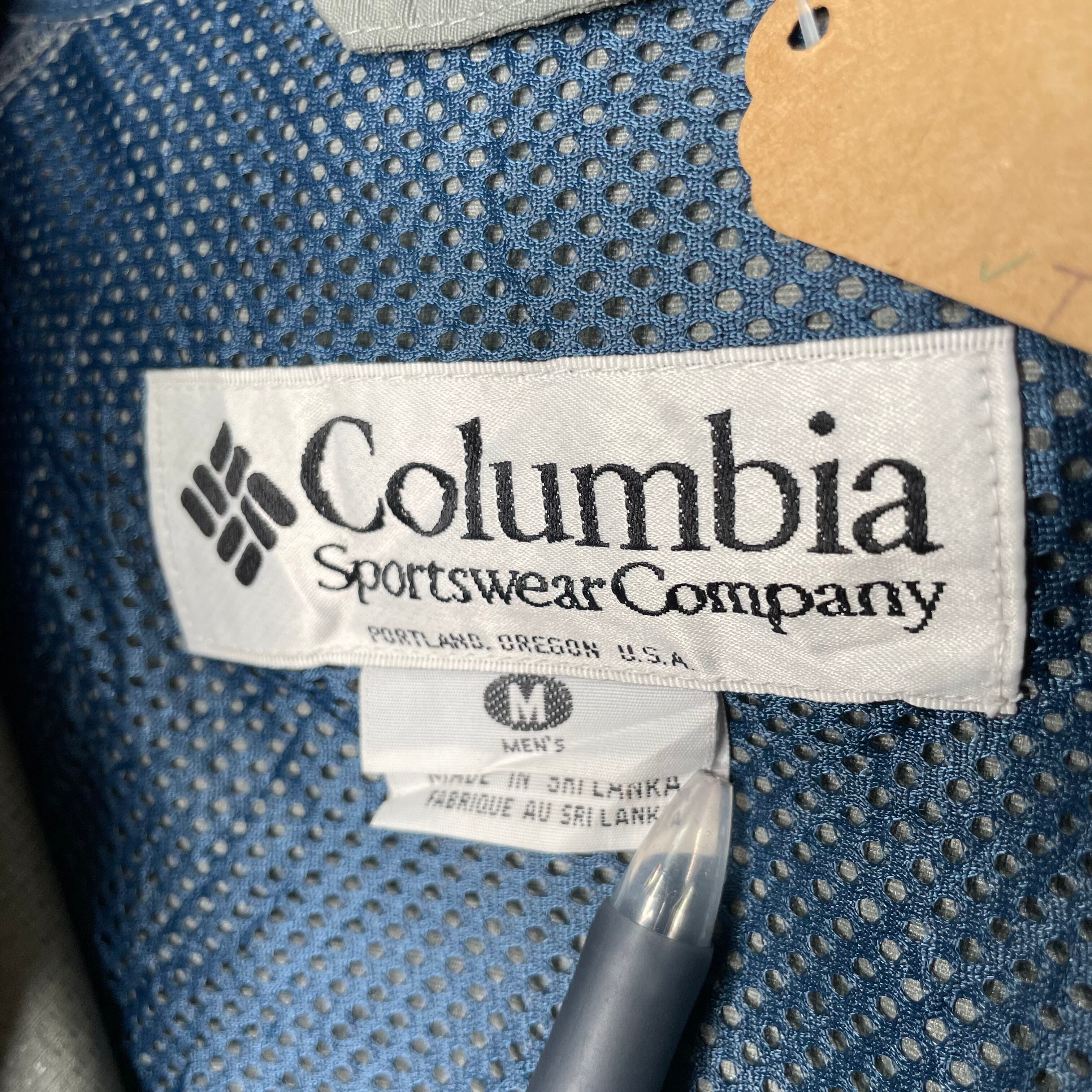 Columbia マウンテンパーカー M(L相当) グレー ハーフジップ ラグランスリーブ 裾ゴム ナイロンジャケットワンポイント刺繍 ...