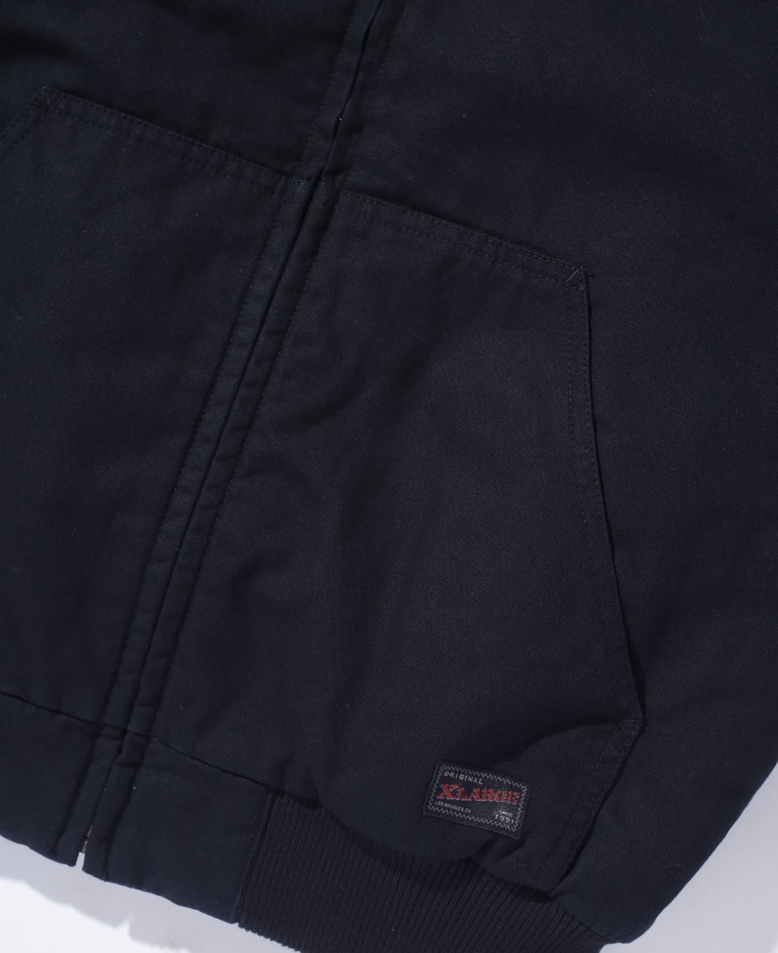 XLARGE PATCHED OLD ENGLISH HOODED WORK JACKET | バイシクルショップサイトウ