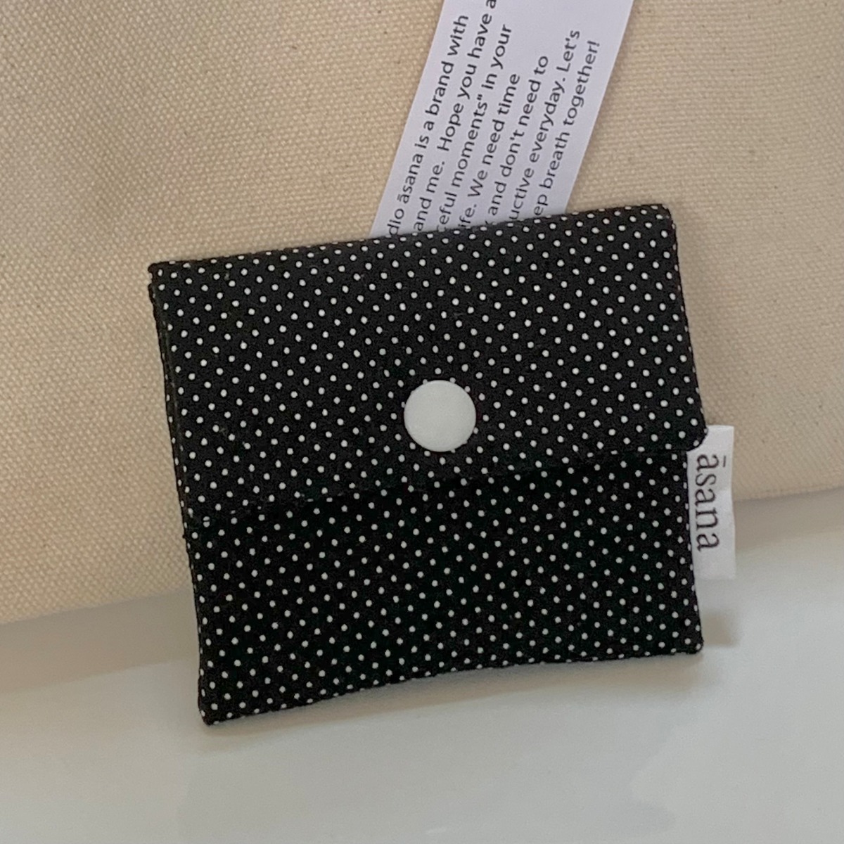 (black) dot button mini pouch | studio āsana