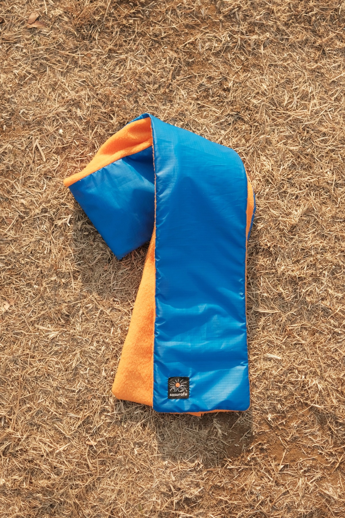 PUFFY MUFFLER blue / orange | sasurafu