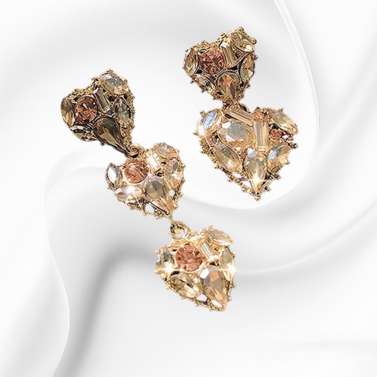 TP051 アシンメトリーゴールドハート ピアス/イヤリング | Mercieve