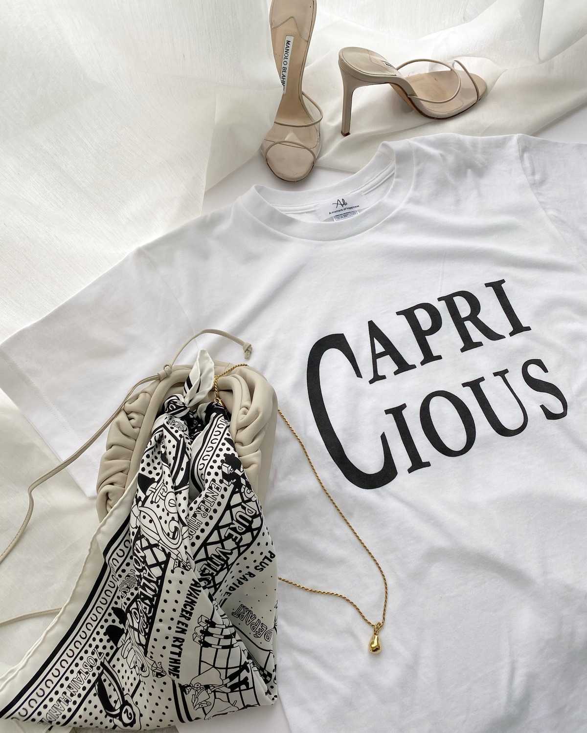 即納商品【CAPRICIOUS】 T-shirt・White×black | Aulii a moment of happiness