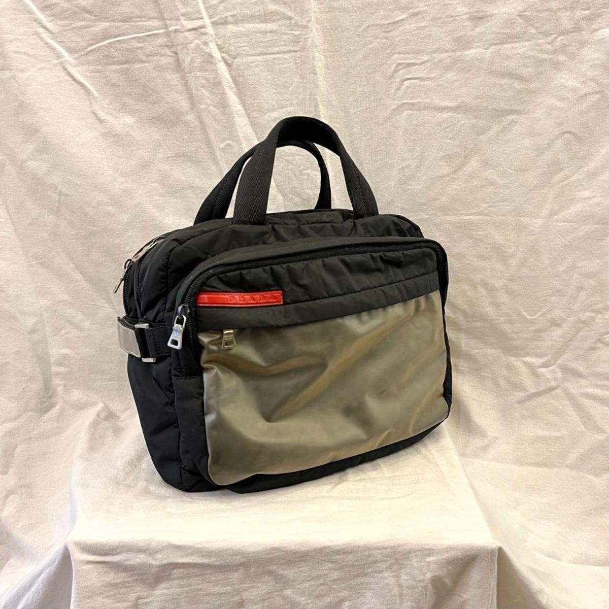 PRADA "Red Tag × Side Reflector" Hand Bag | CARBOOTS