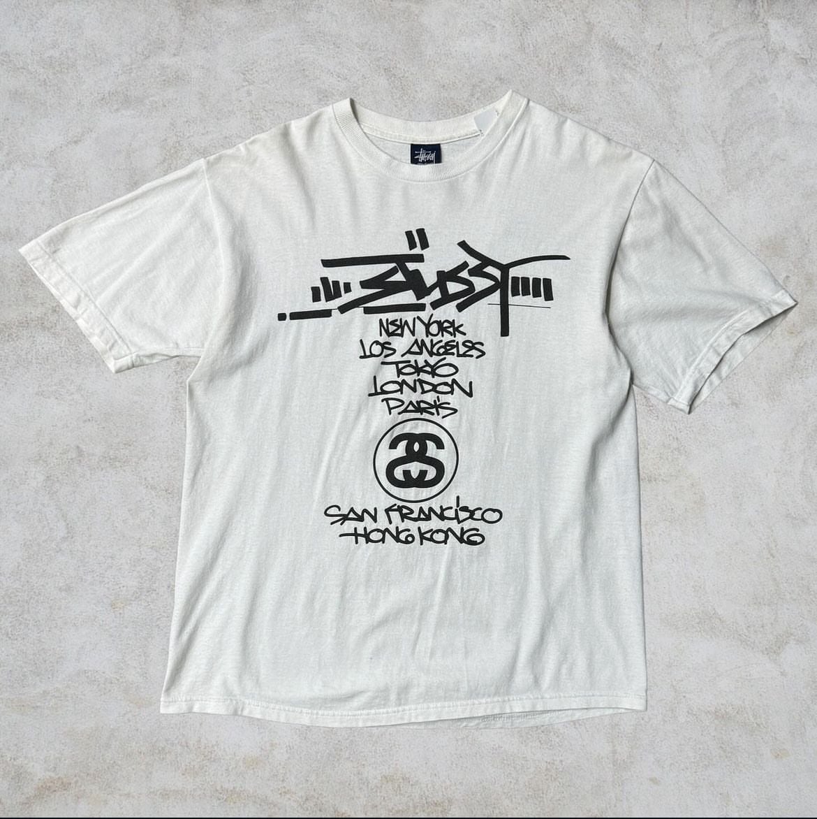 00's old stussy × KOFIE World Tour Design Tee “CUSTOMADE 00's old stussy × KOFIE World Tour Design Tee “CUSTOMADE