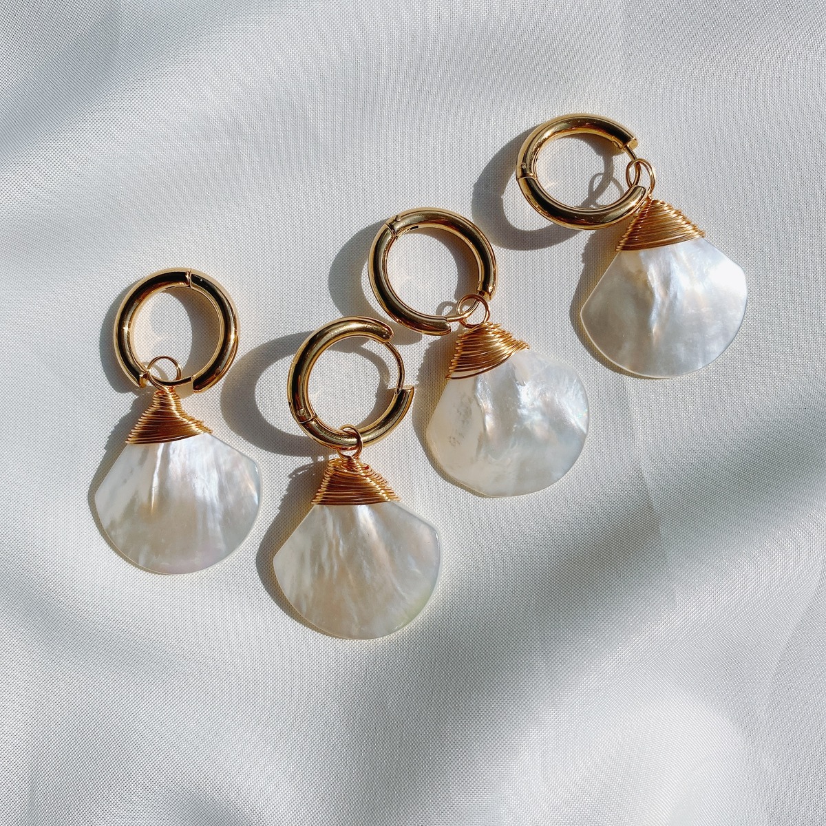 stainless white shell hoop pierce | AKINAWAN