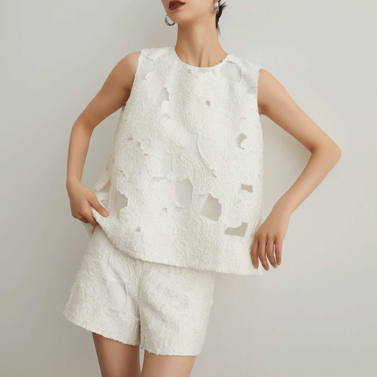 ホワイトシアーノースリーブベスト T10001 | Héritas