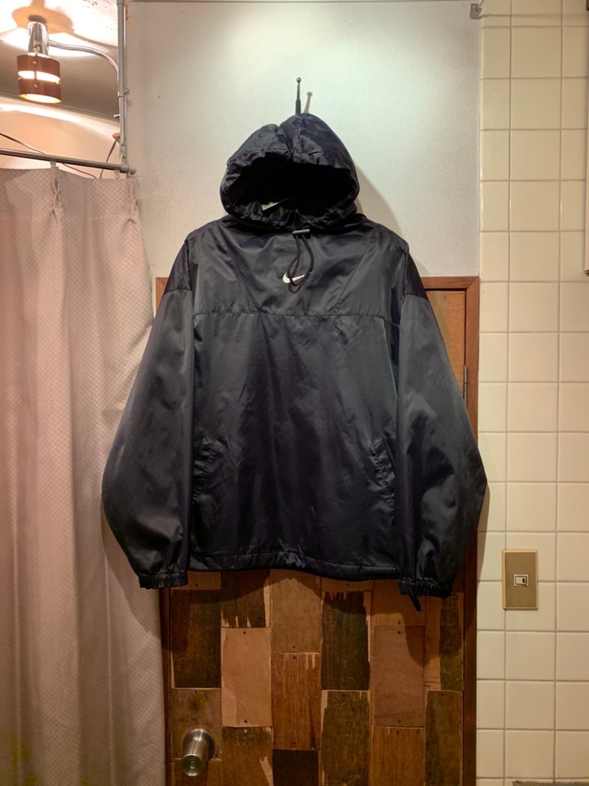 “NIKE” black nylon high-neck pullover parka | LAUGH